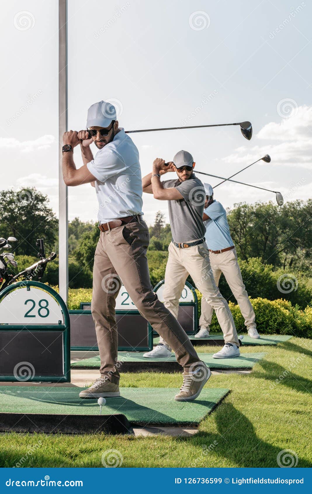 Group of Focused Gstylish Playing Golf Together Stock Image - Image of ...