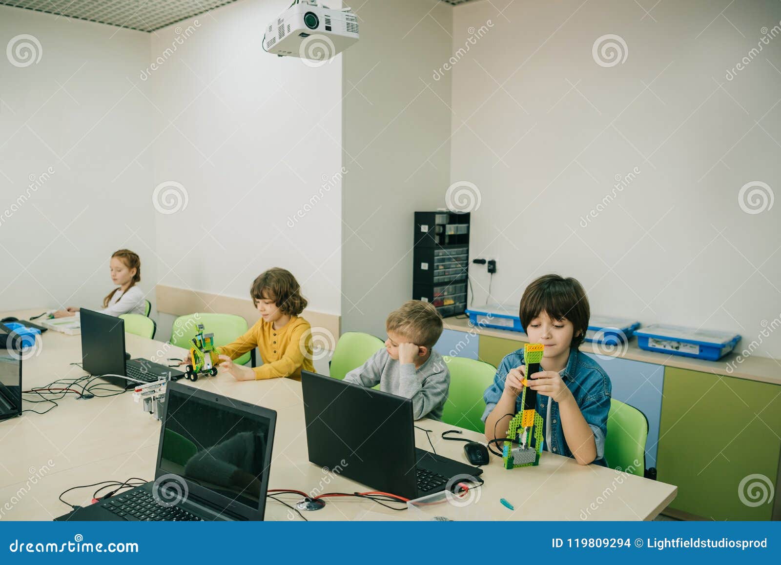 Group of Focused Kids Working on Projects at Stem Stock Photo - Image ...