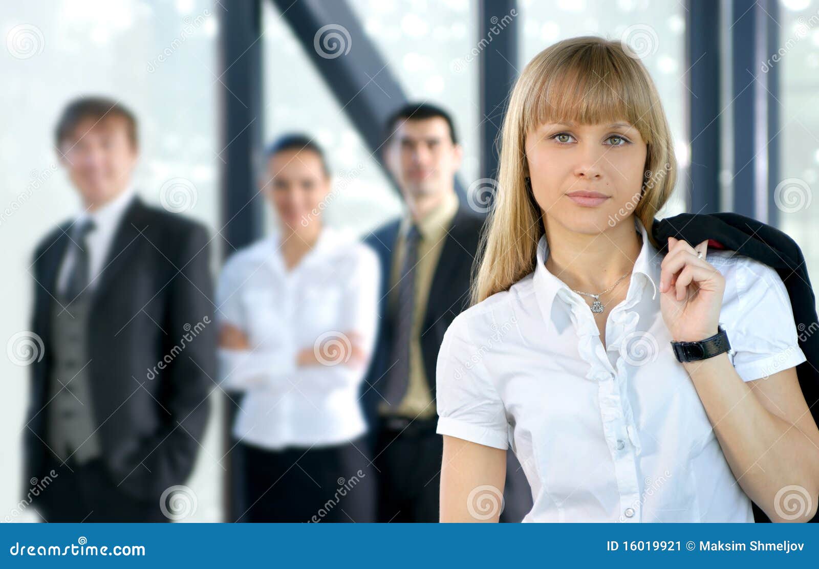A Group of Four Business Persons in an Office Stock Image - Image of ...