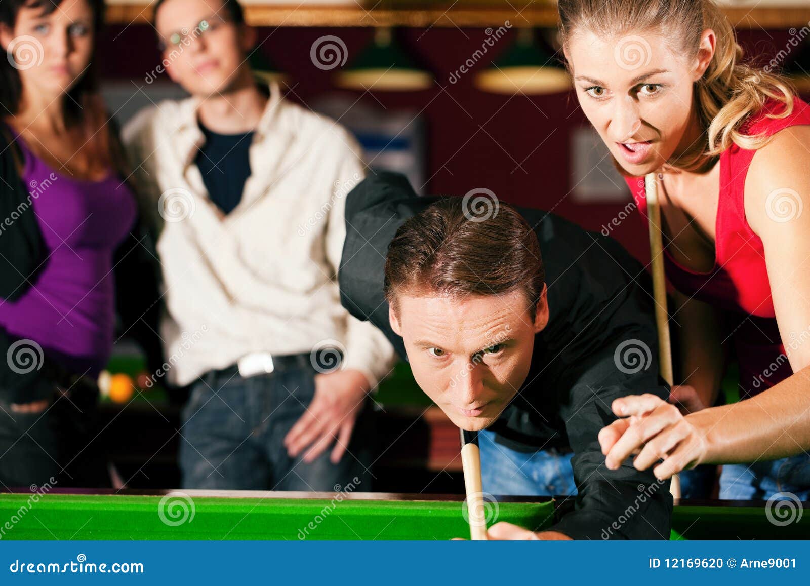 Group of Four Friends in a Billiard Hall Playing S Stock Photo - Image ...