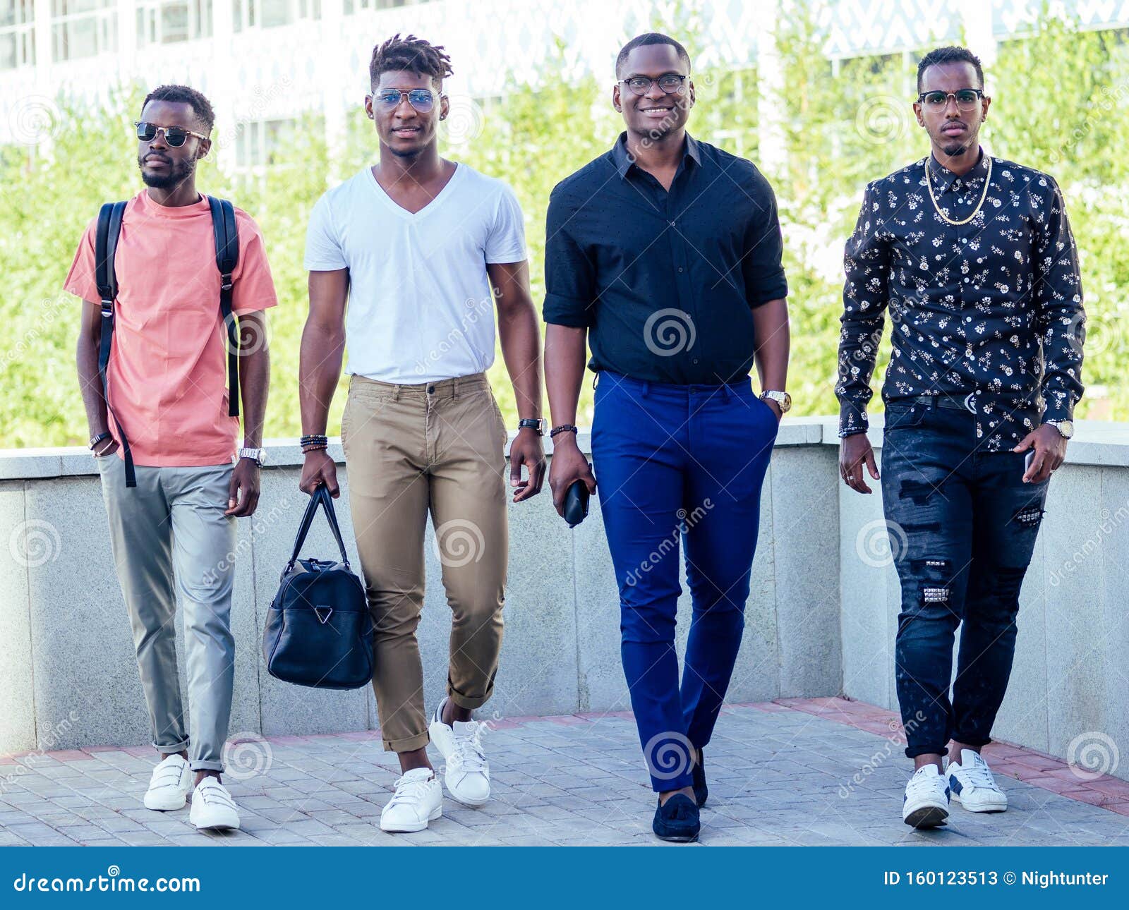A Group of Four Handsome African Businessman American Man Stylish Walk ... A Group of Four Handsome African Businessman American Man Stylish Walk ...