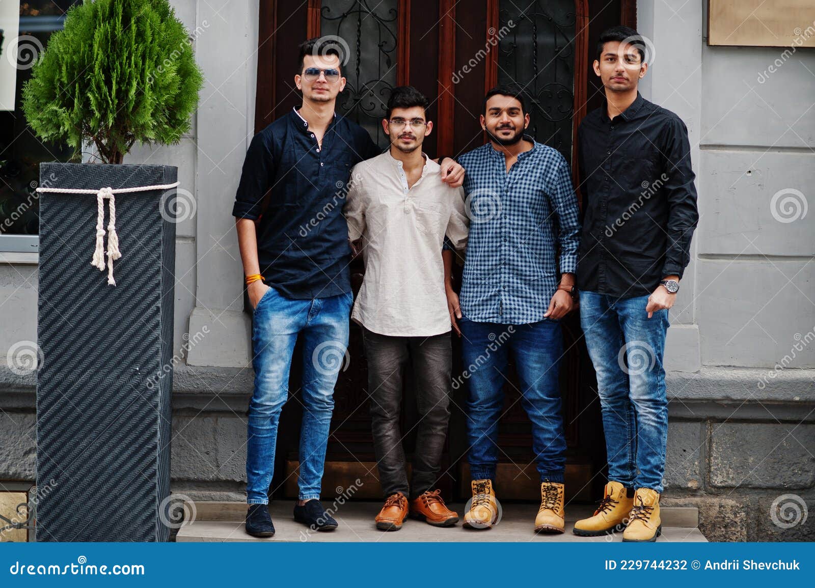 Group of four indian man stock photo. Image of fashion - 229744232