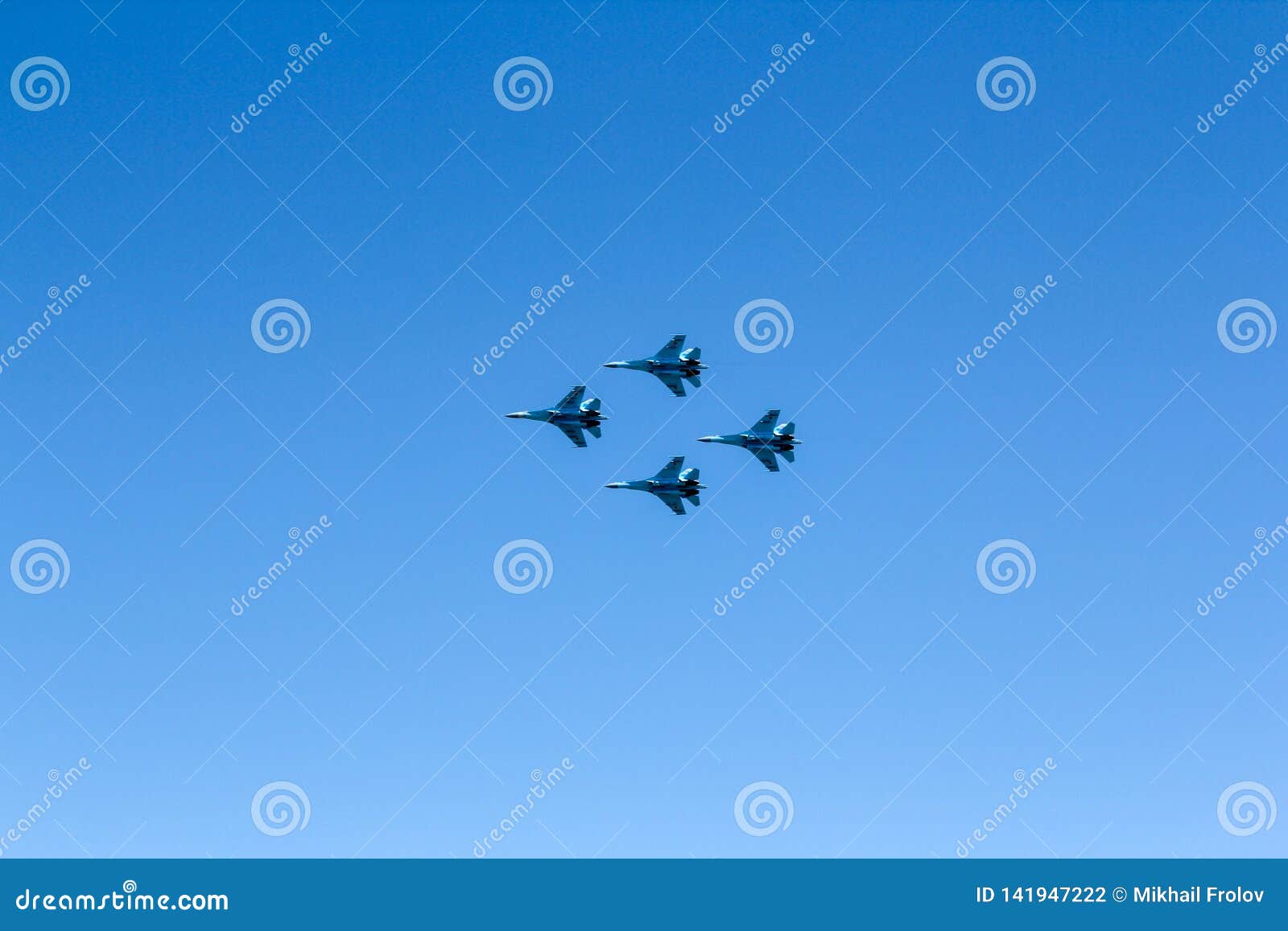 Group of Four Jet Fighters in the Blue Sky Stock Photo - Image of ...