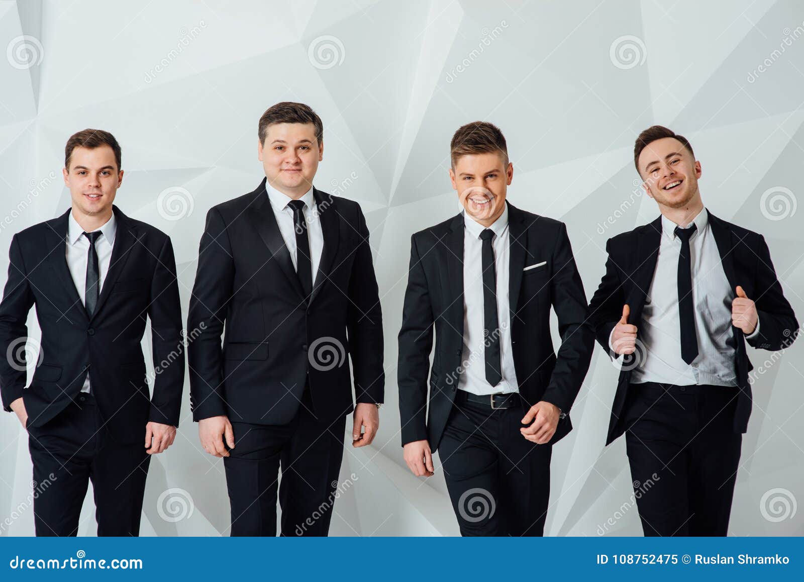 Group of Four Men in Suits White Background Stock Image - Image of ...