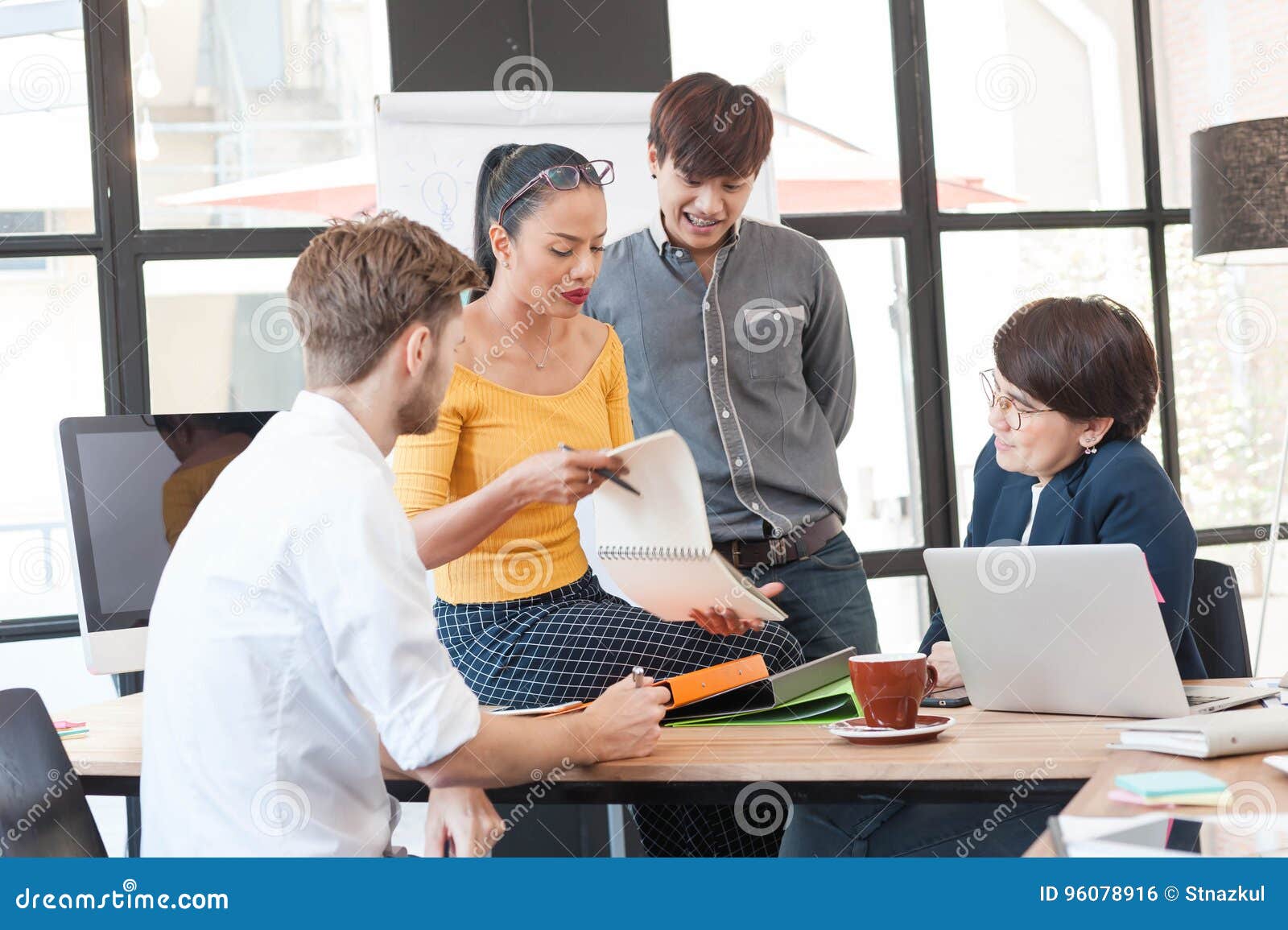 Group of Four Multi Generation of Creative Work Place, Modern St Stock ...