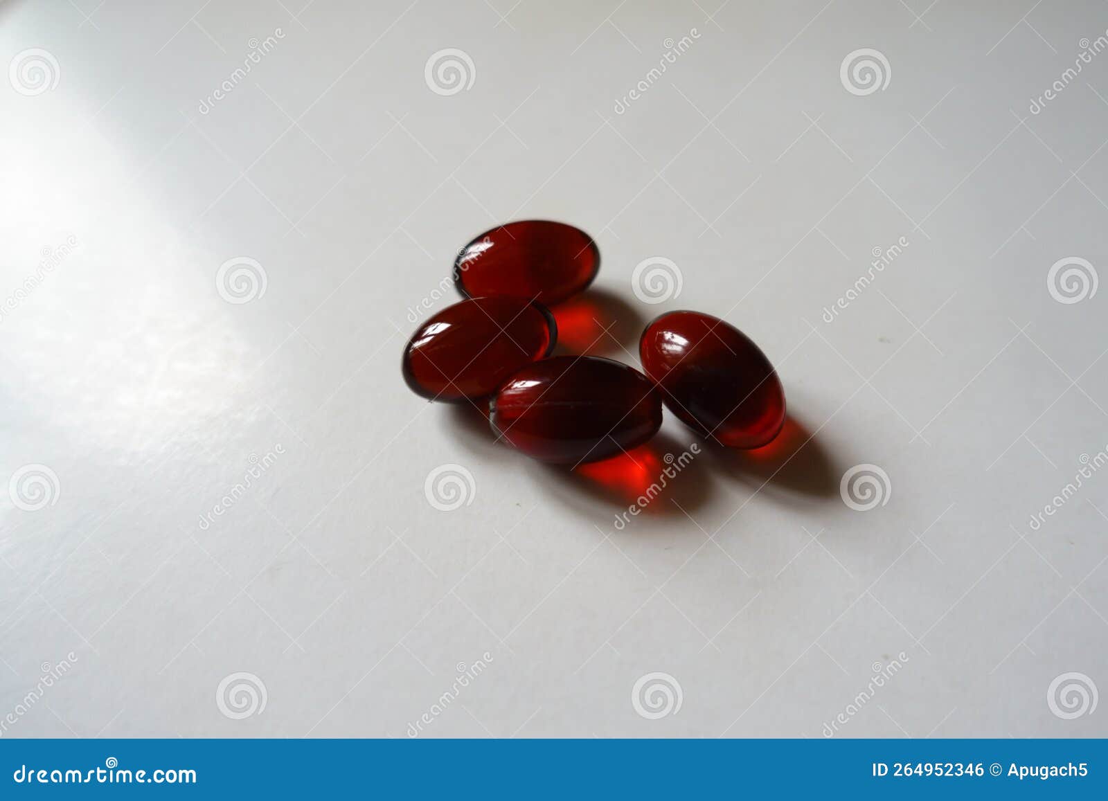 Group of Four Red Capsules of Krill Oil Stock Photo - Image of ...
