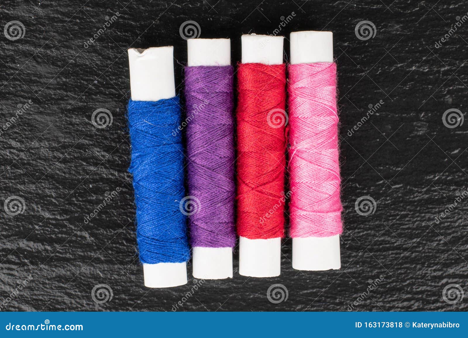 Sewing Thread Spool on Grey Stone Stock Photo - Image of dyed, flax ...