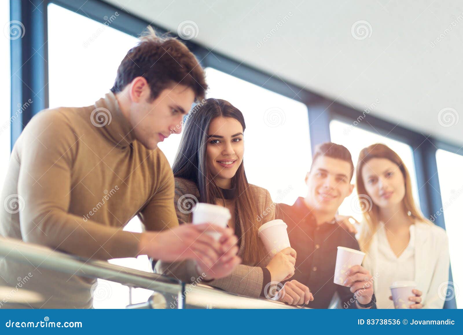 Group of Four Young Business People on a Coffee Break Stock Photo ...
