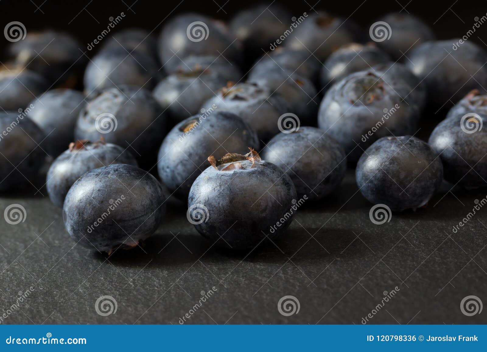 Group of Fresh Blueberries on a Dark Stone Table Stock Photo - Image of ...