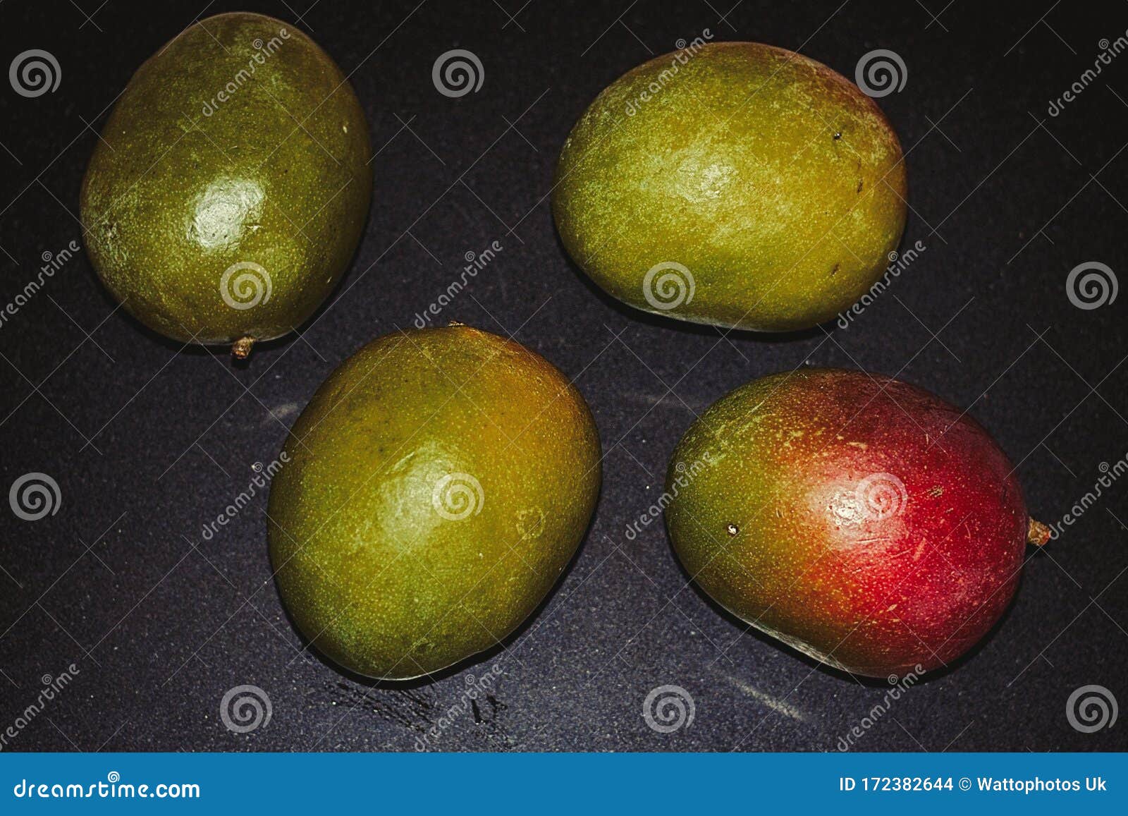 Group of Fresh Ripe Mangos on Marble Chopping Board Stock Photo - Image ...