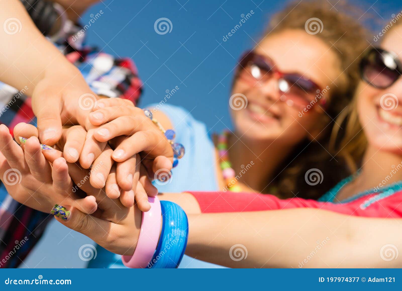Young Friends Folded Hands Together, Teamwork Concept Stock Image ...
