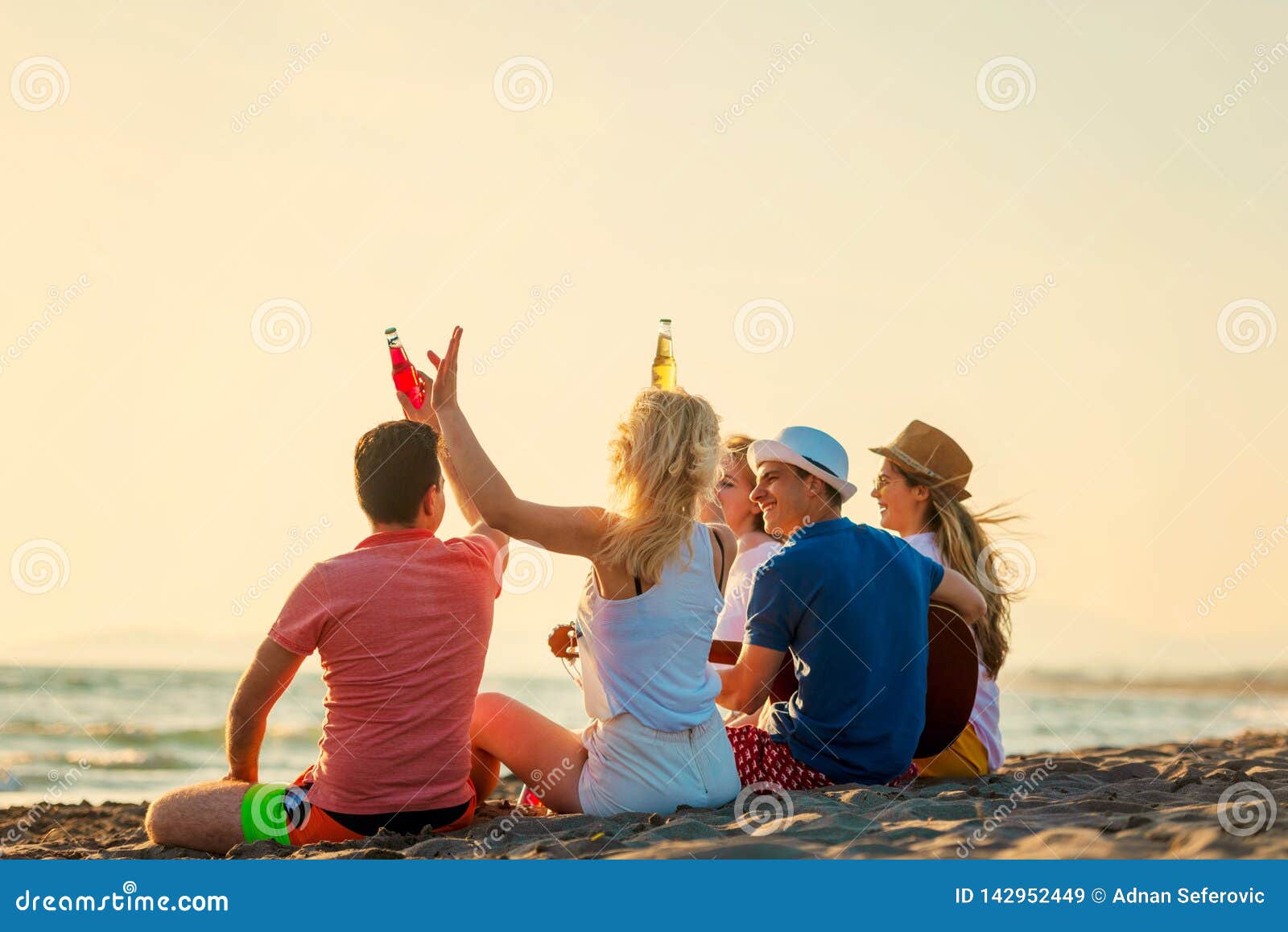 Group of Friends Play on the Beach Stock Image - Image of holiday ...