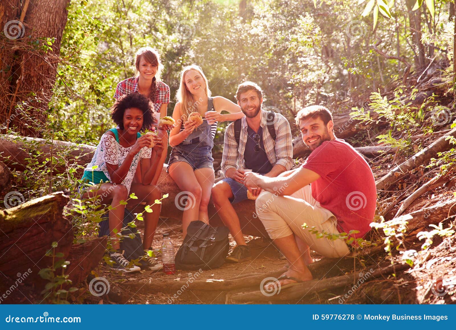 Group of Friends Breaking for Lunch on Countryside Walk Stock Photo ...