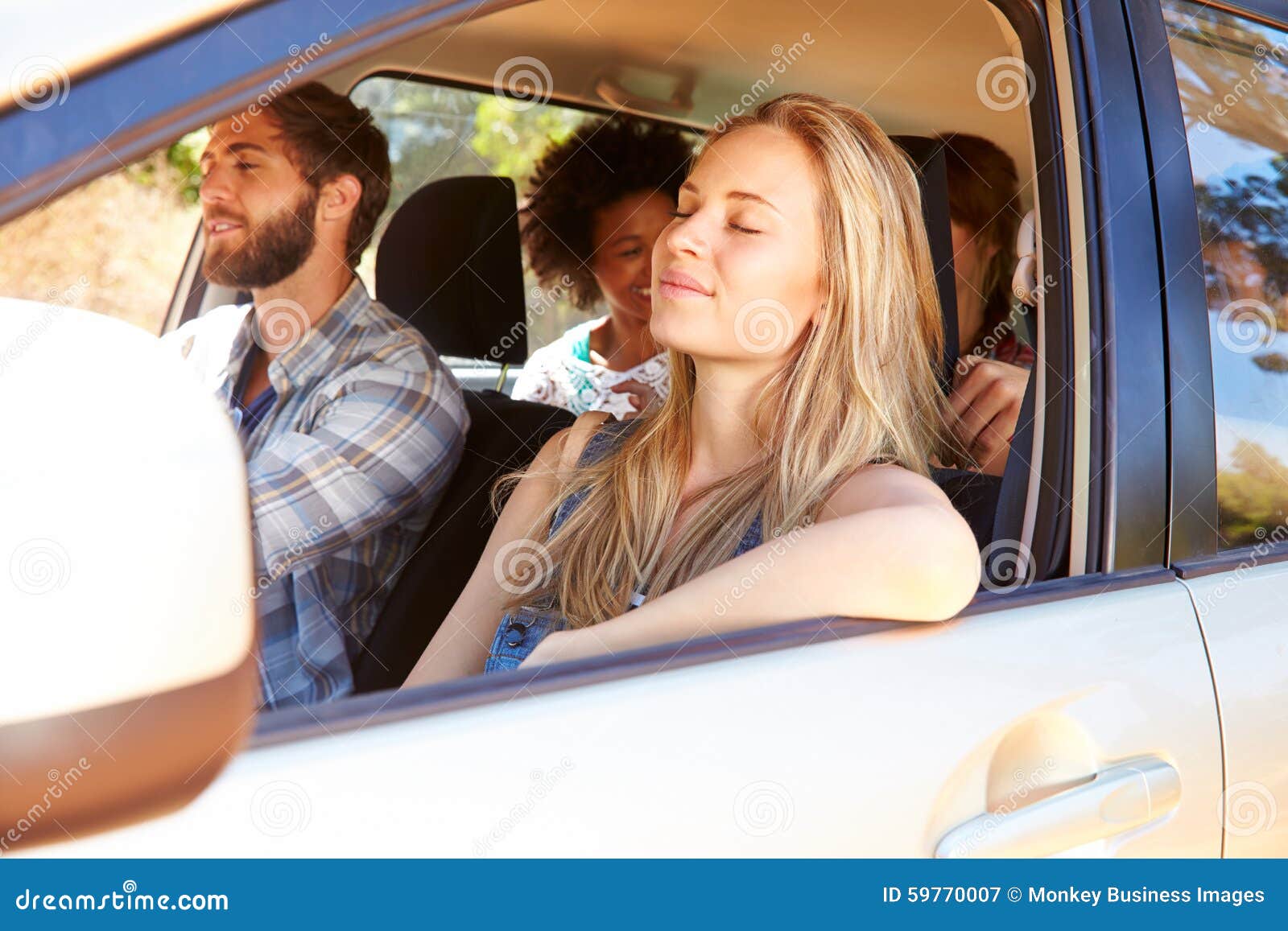 Group of Friends in Car on Road Trip Together Stock Image - Image of ...