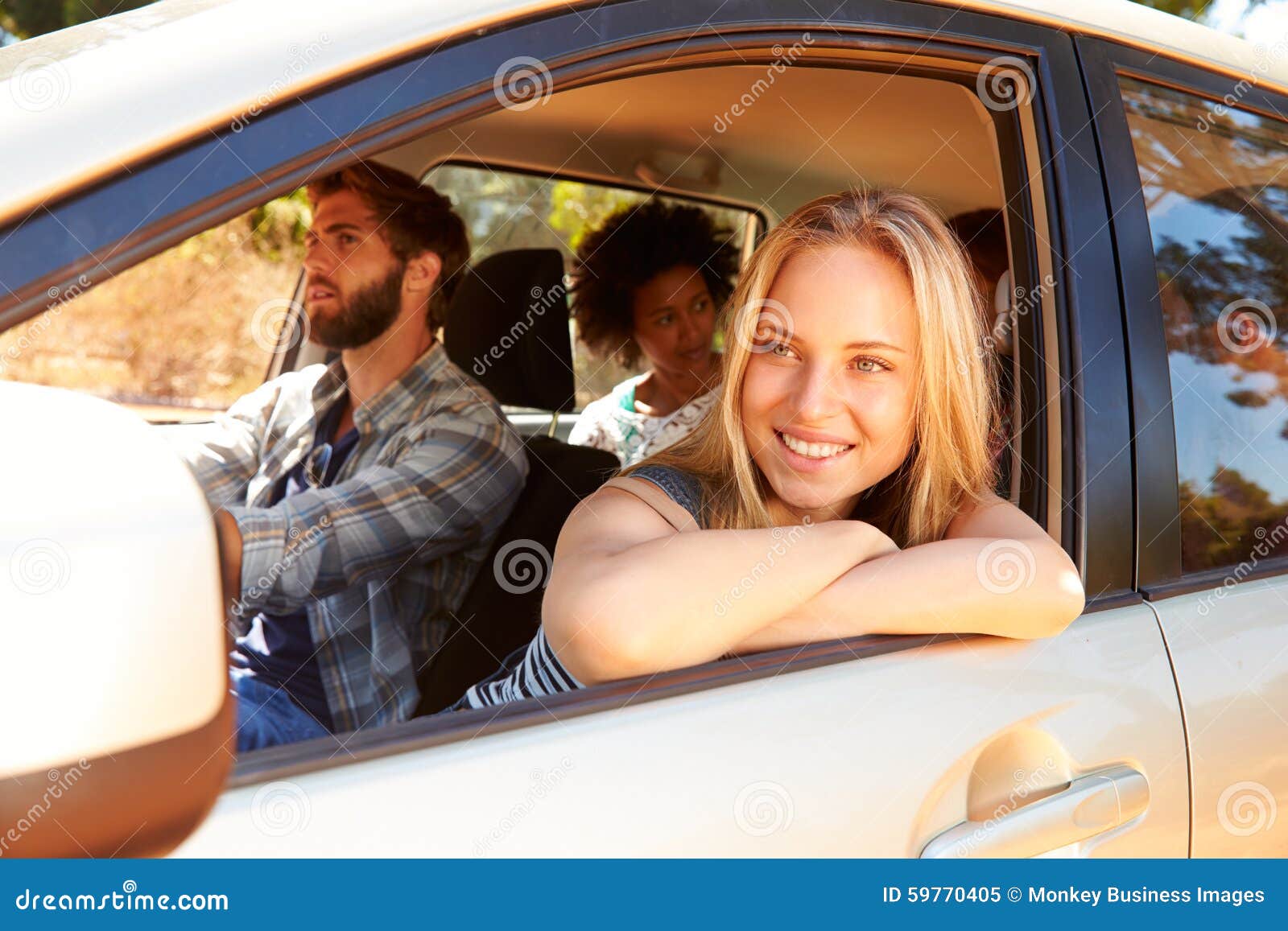 Group of Friends in Car on Road Trip Together Stock Image - Image of ...