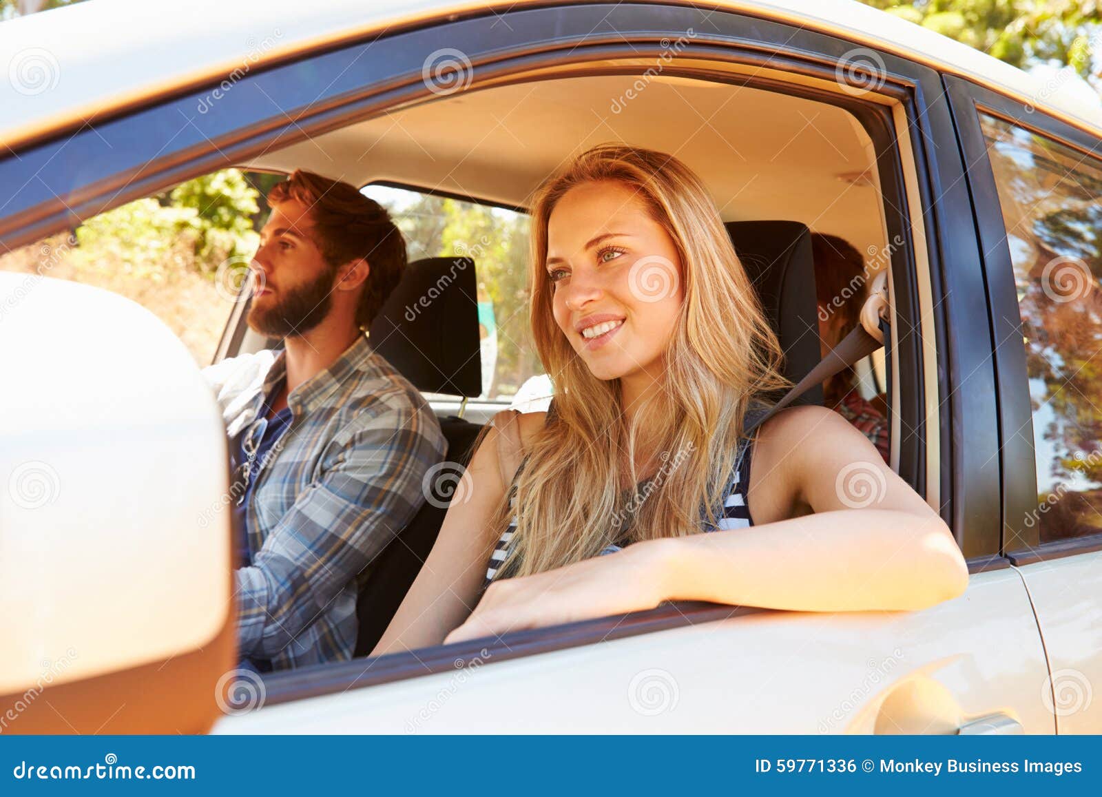 Group of Friends in Car on Road Trip Together Stock Photo - Image of ...