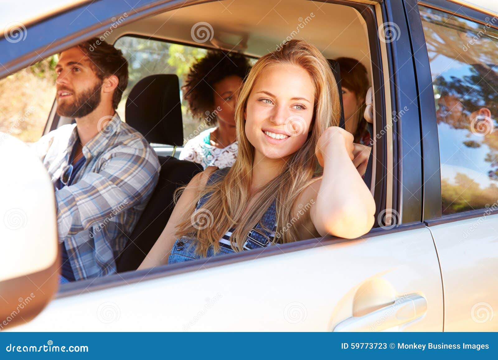 Group of Friends in Car on Road Trip Together Stock Image - Image of ...