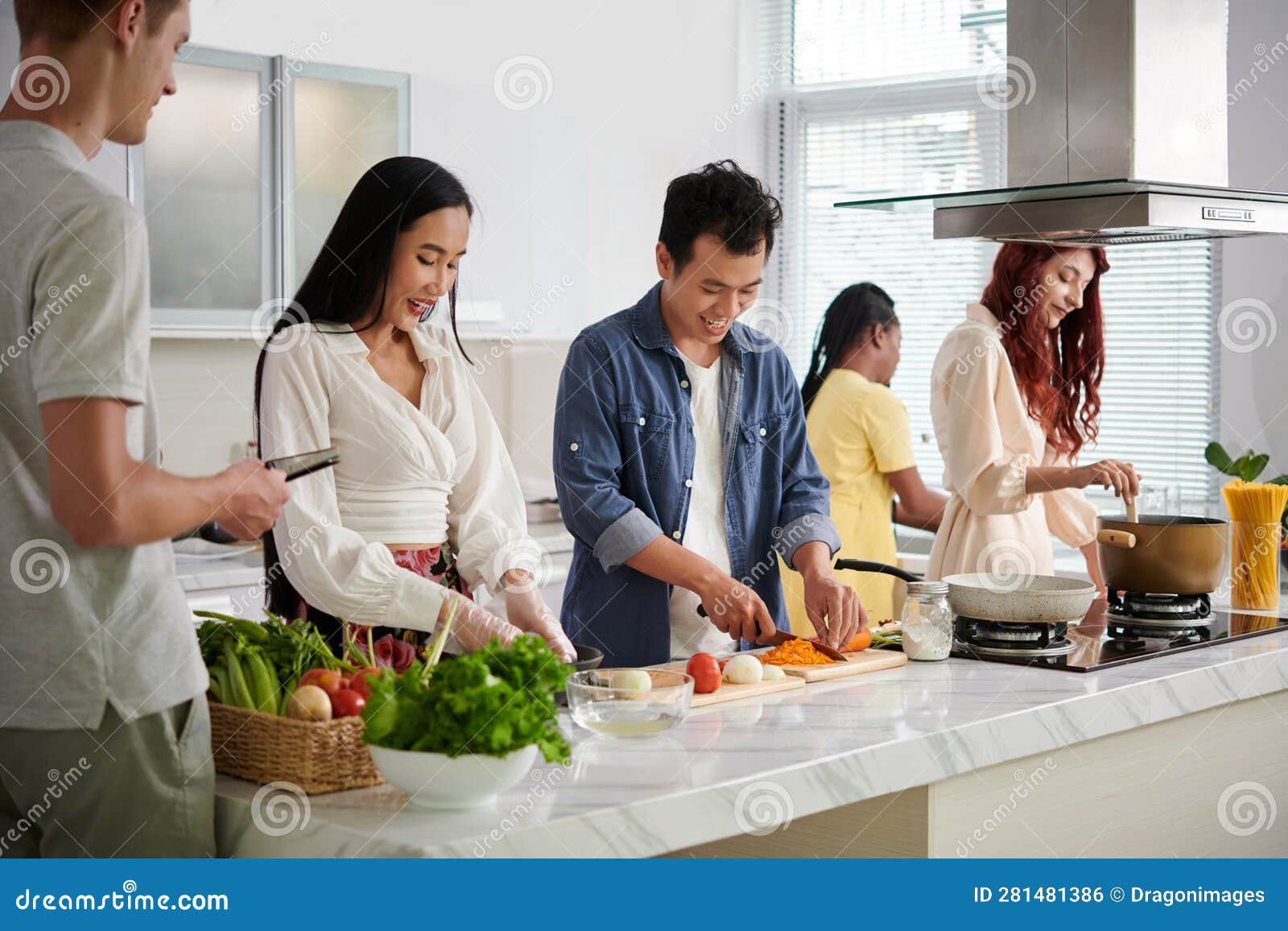 Group of Friends Cooking Dinner Stock Photo - Image of help, together ...