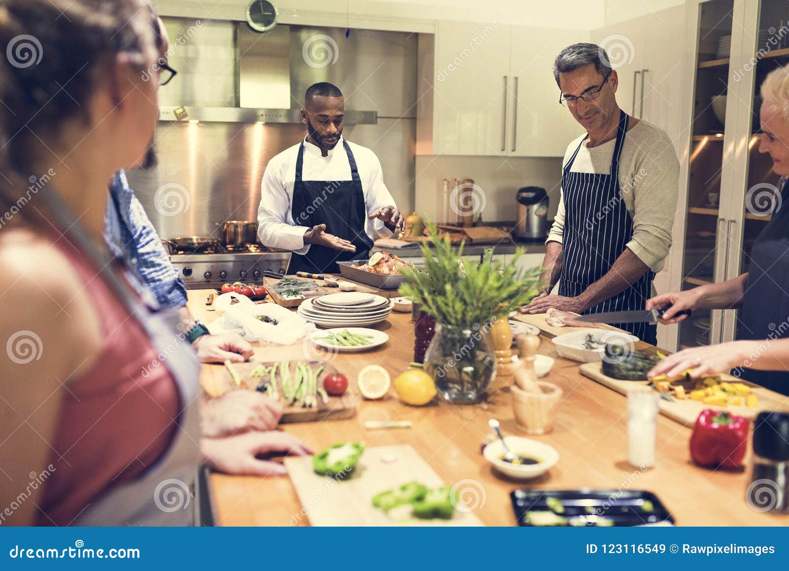 Group of Friends are Cooking in the Kitchen Stock Image - Image of ...