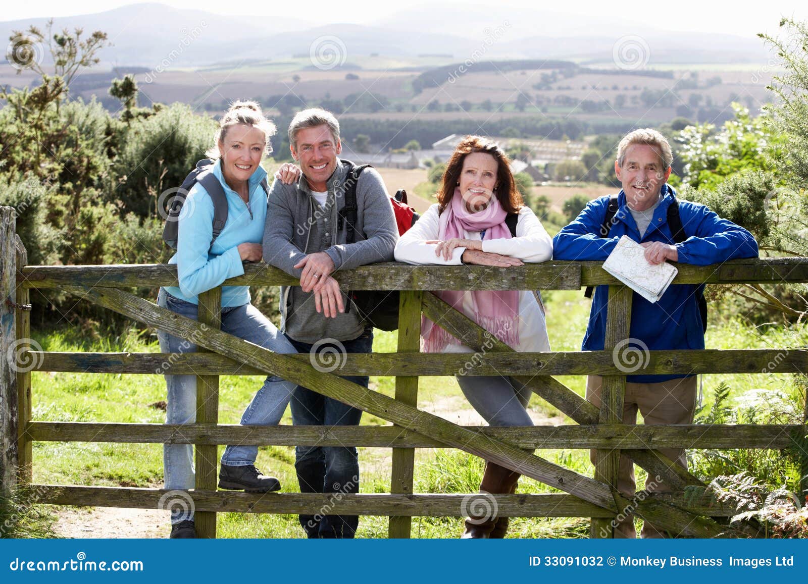 Group of Friends on Country Walk Stock Photo - Image of fence, hike ...