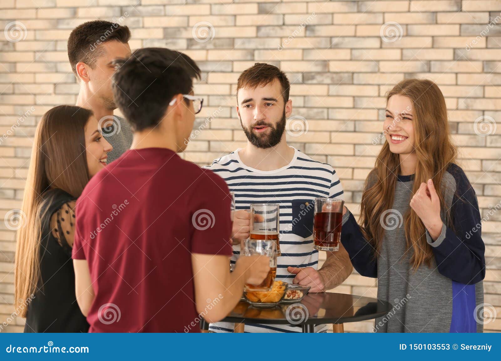Group of Friends Drinking Beer in Bar Stock Image - Image of asian ...