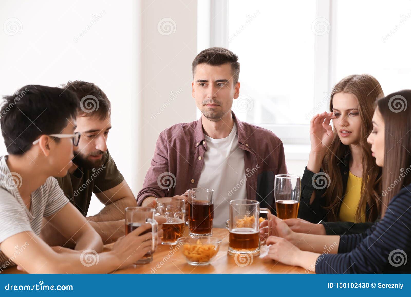 Group of Friends Drinking Beer in Bar Stock Photo - Image of ...