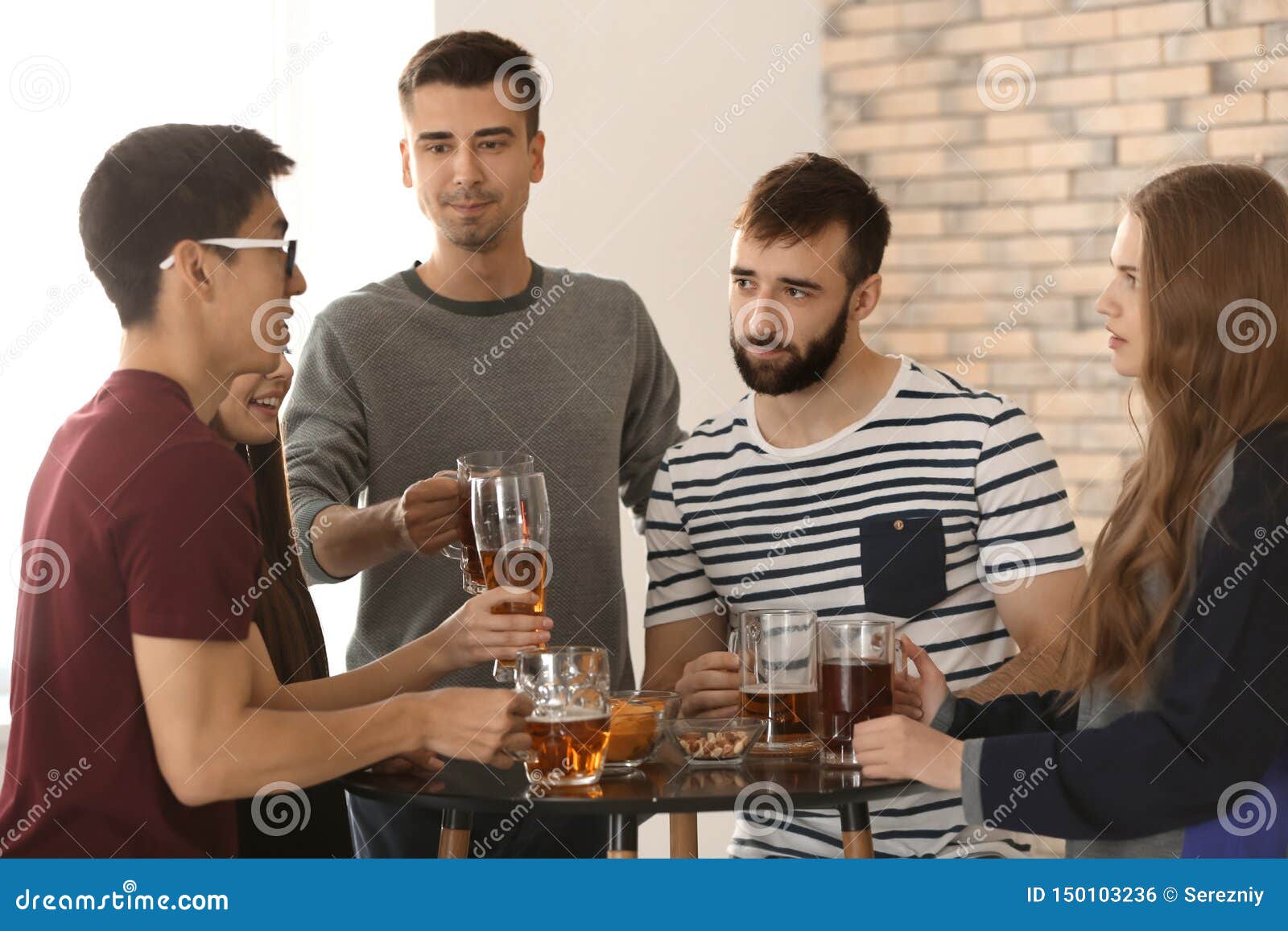 Group of Friends Drinking Beer in Bar Stock Photo - Image of food ...