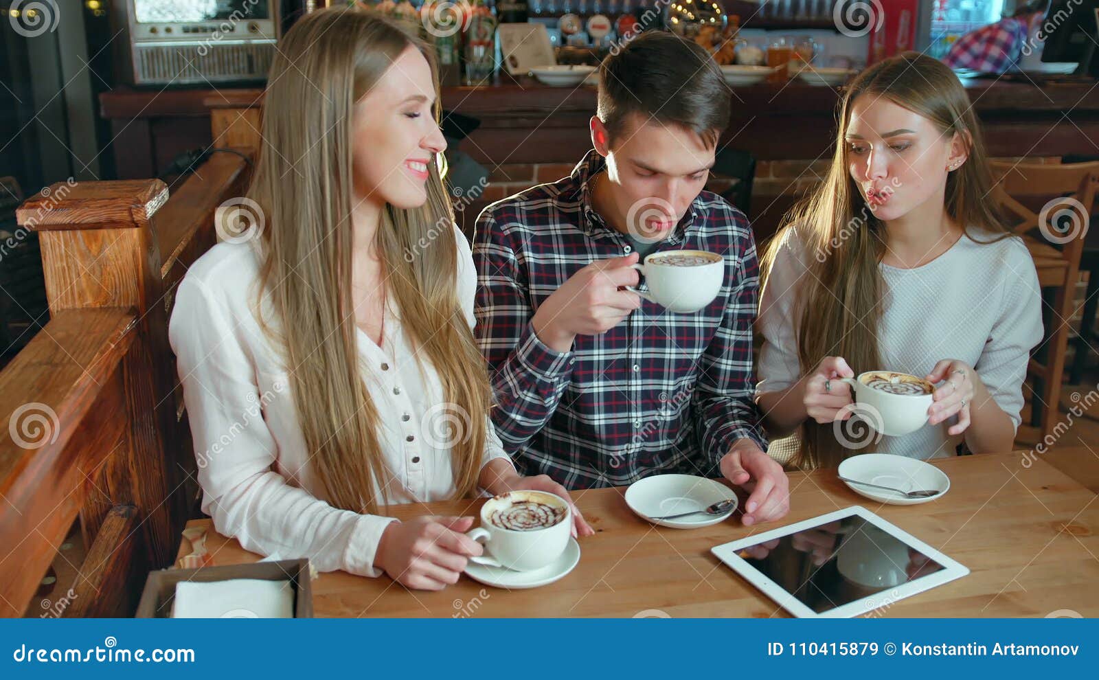 Group of Friends Drinking Coffee and Talking in Cafe Stock Video ...