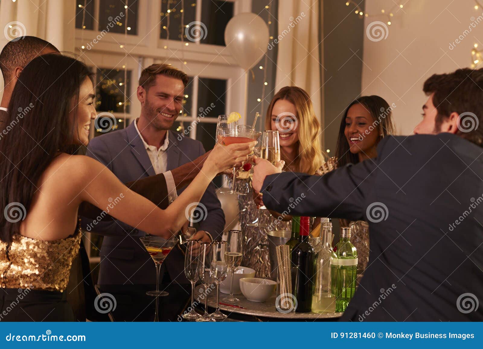Group of Friends with Drinks Enjoying Cocktail Party Stock Photo ...