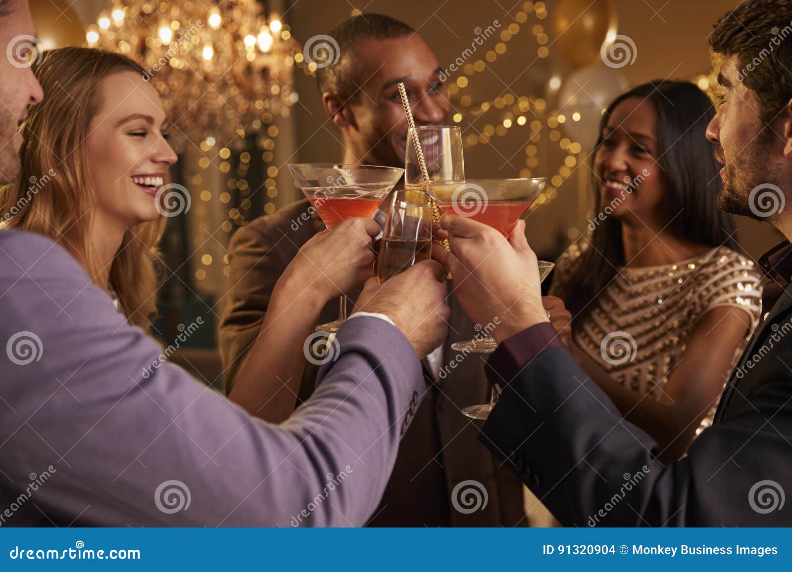 Group of Friends with Drinks Enjoying Cocktail Party Stock Photo ...