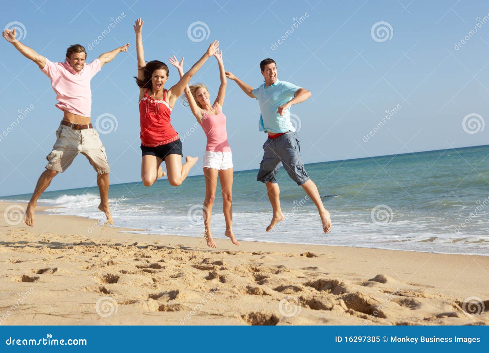 Group of Friends Enjoying Beach Holiday in the Sun Stock Image - Image ...