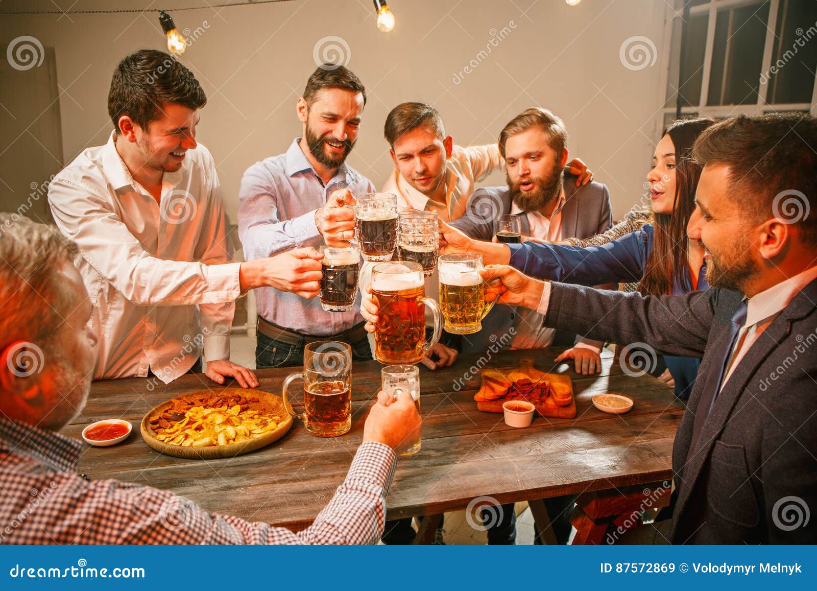 Group of Friends Enjoying Evening Drinks with Beer Stock Image - Image ...