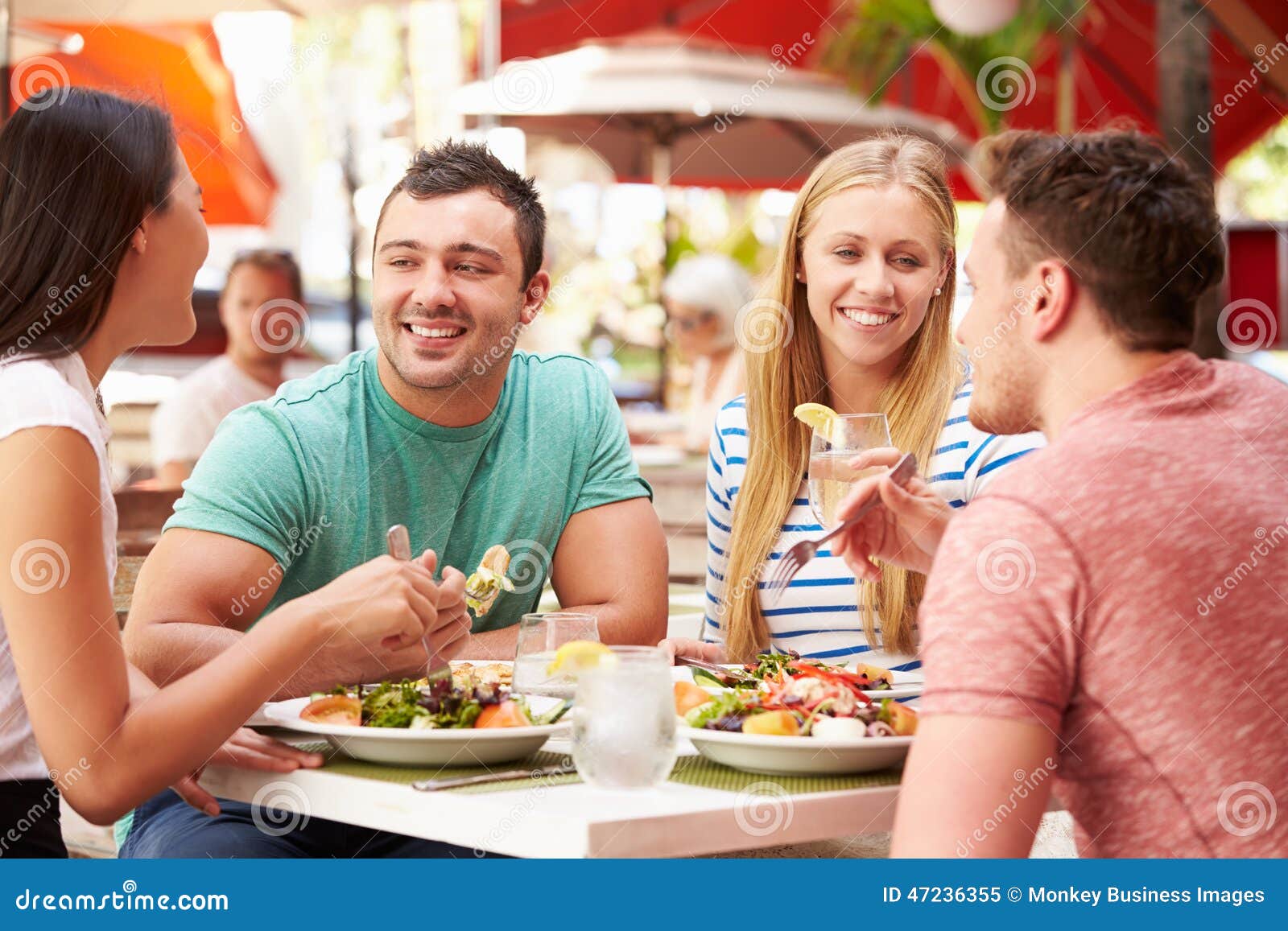 Group of Friends Enjoying Lunch in Outdoor Restaurant Stock Image ...