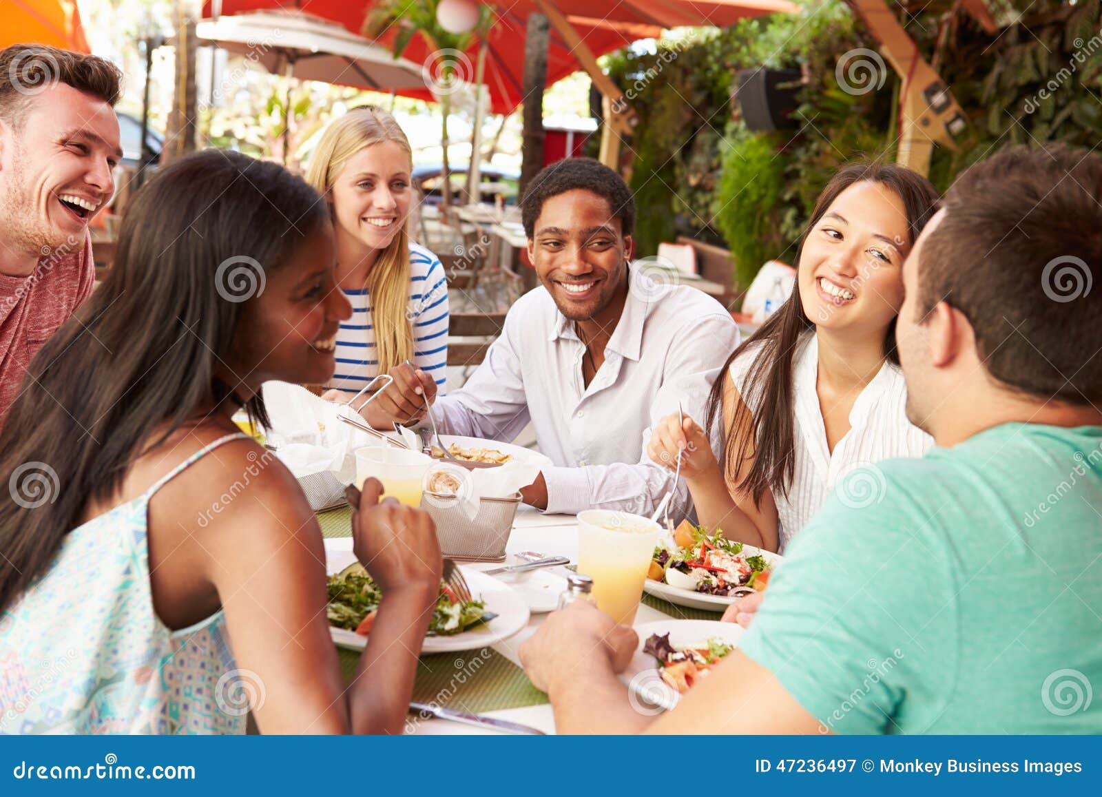 Group of Friends Enjoying Lunch in Outdoor Restaurant Stock Image ...