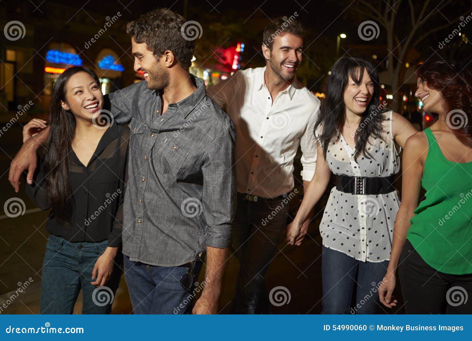 Group of Friends Enjoying Night Out Together Stock Photo - Image of ...