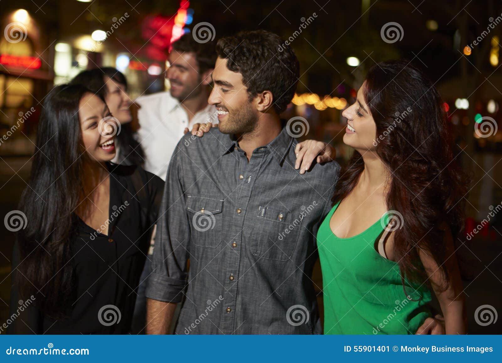Group of Friends Enjoying Night Out Together Stock Image - Image of ...