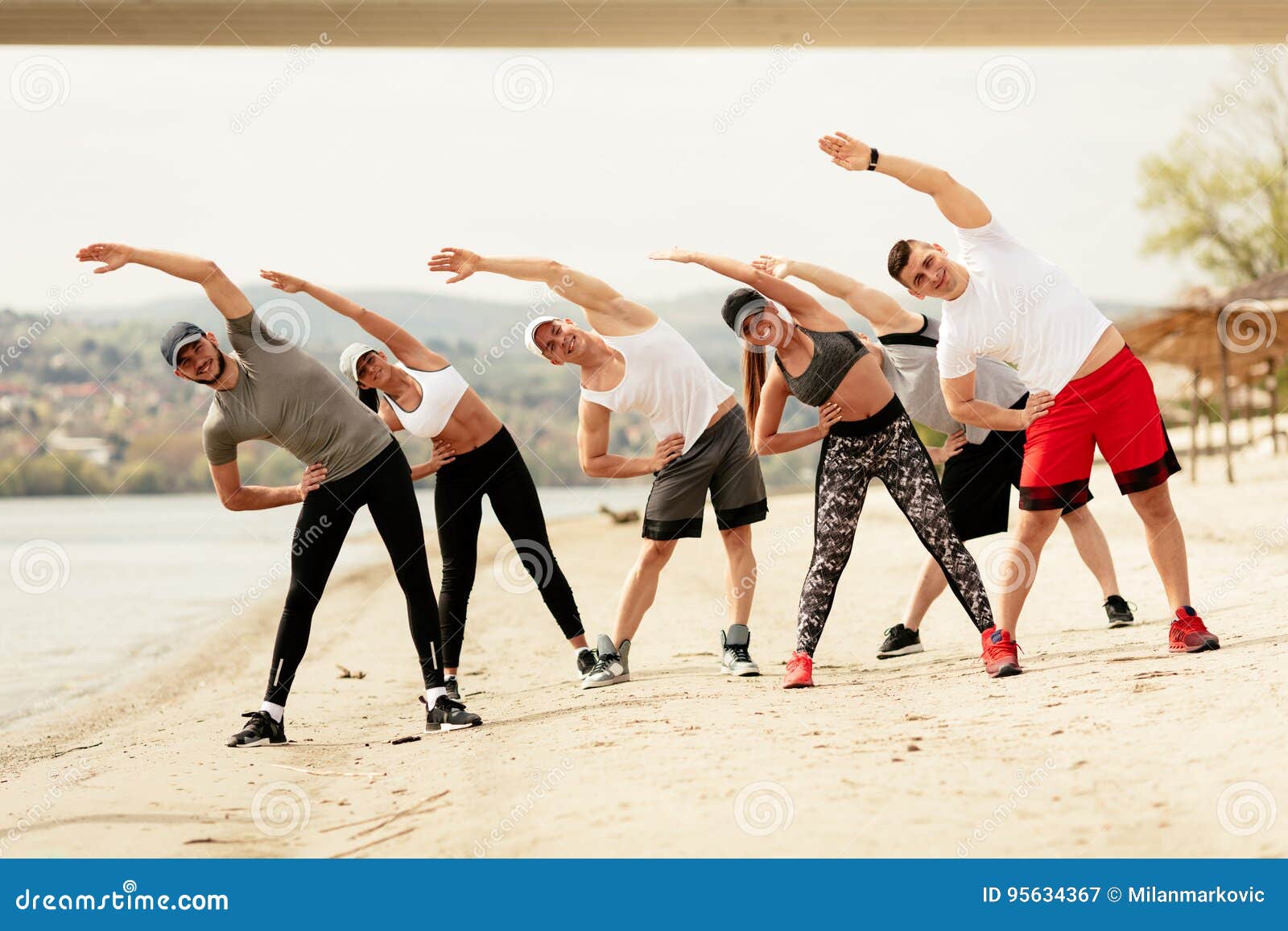 Group Friends Exercising on the Beach Stock Image - Image of happiness ...