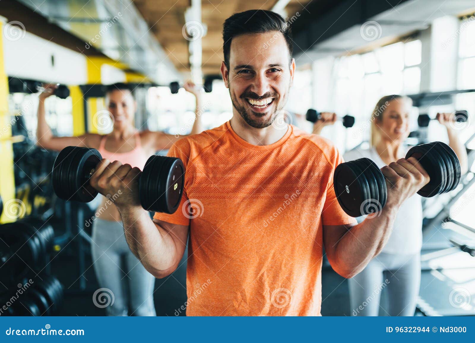 Group of Friends Exercising Together in Gym Stock Photo - Image of ...