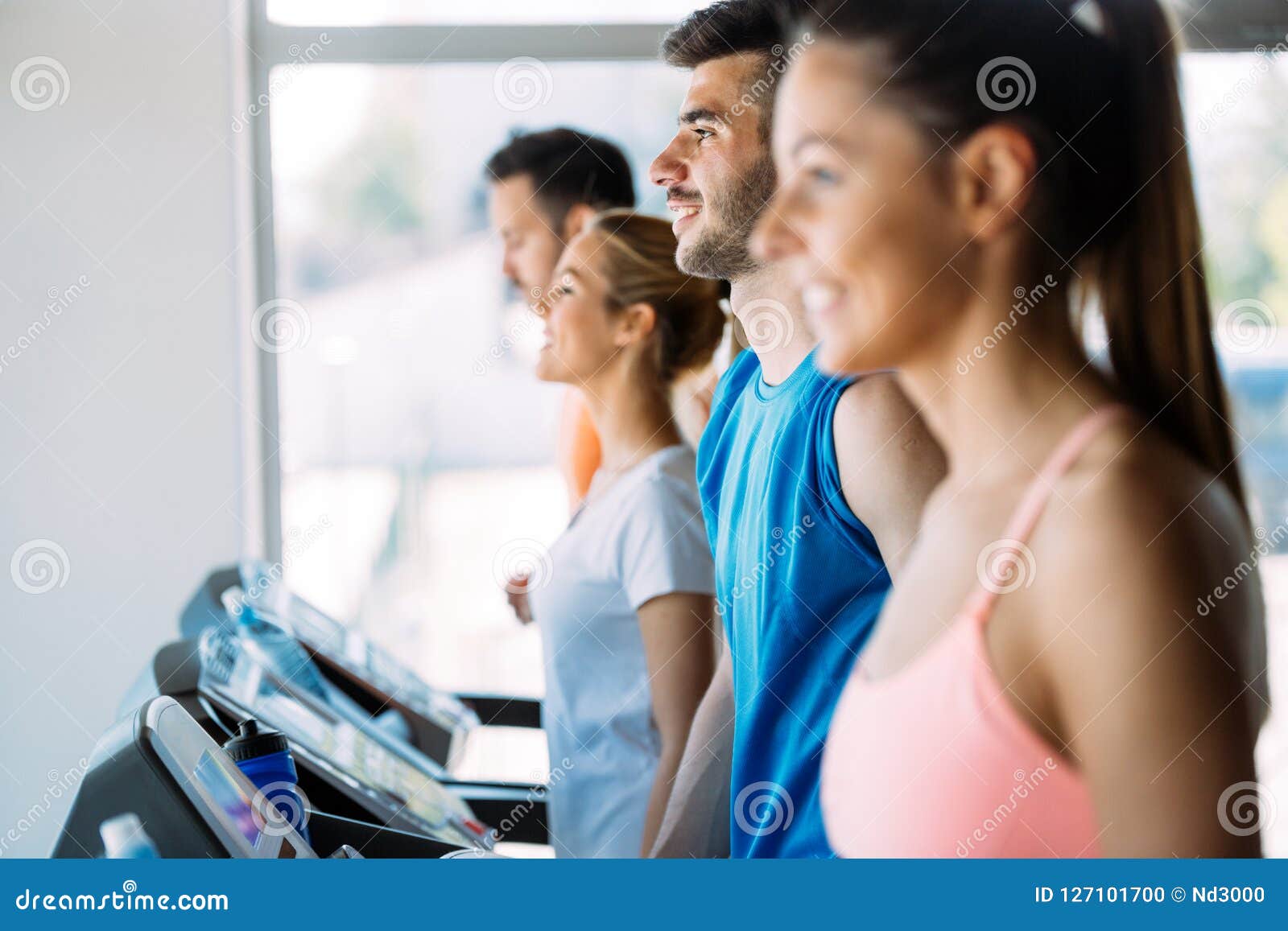 Group of Friends Exercising on Treadmill Machine Stock Photo - Image of ...