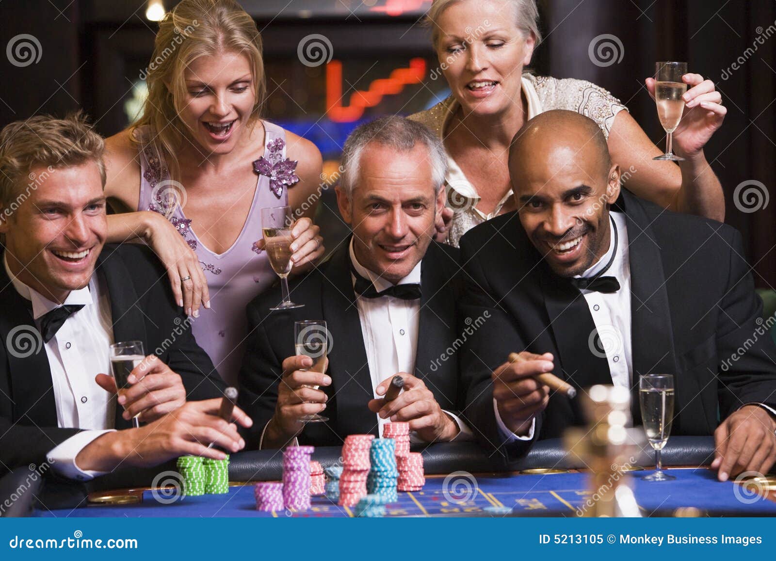 Group of Friends Gambling at Roulette Table Stock Image - Image of ...