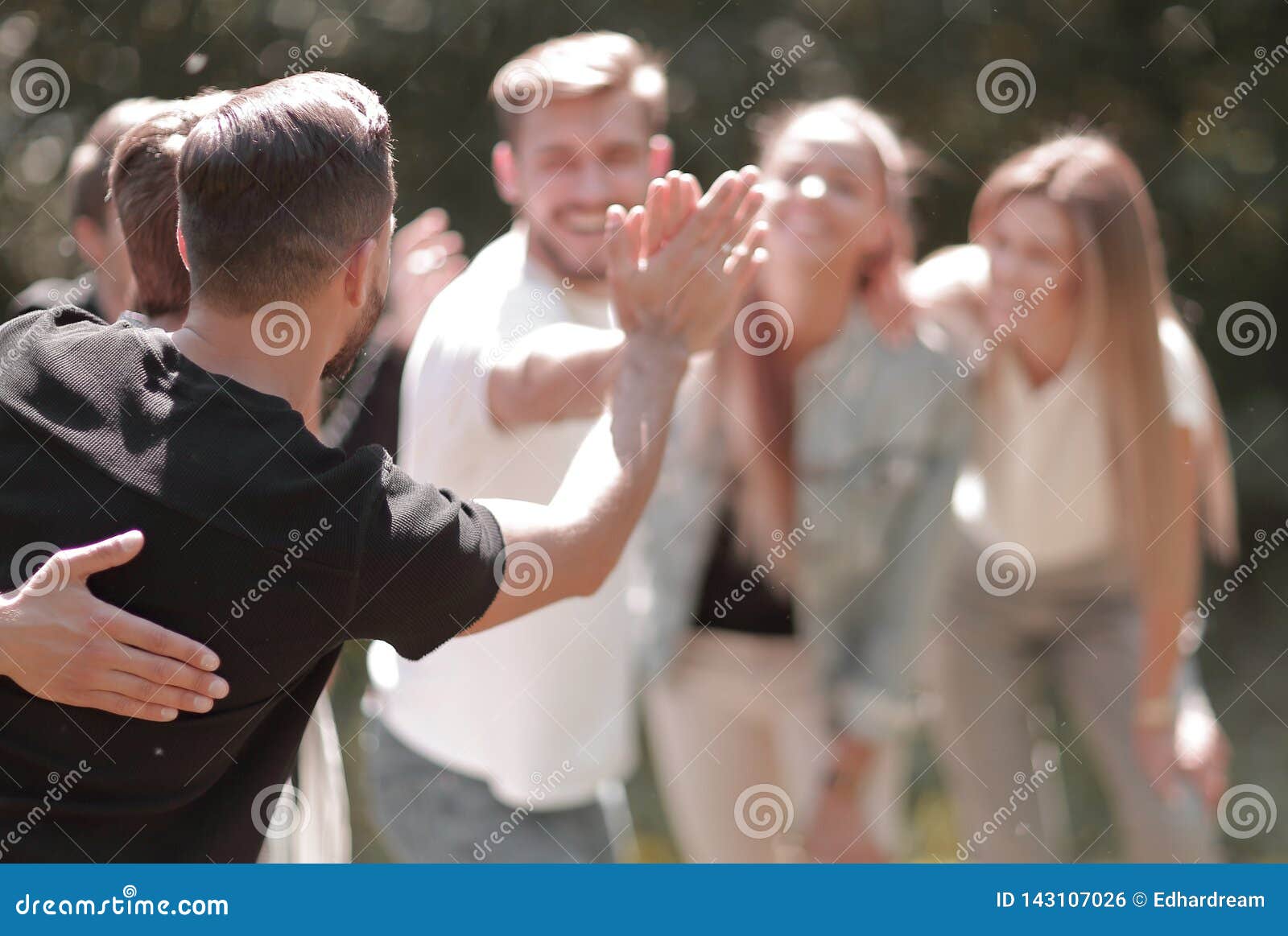 Group of Friends Giving Each Other a High Five Stock Photo - Image of ...