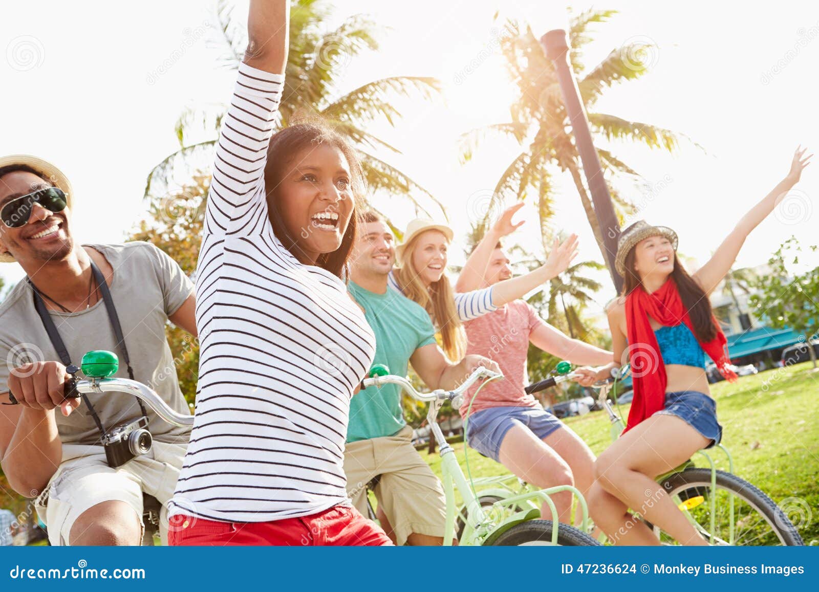 Group of Friends Having Fun on Bicycle Ride Stock Photo - Image of ...