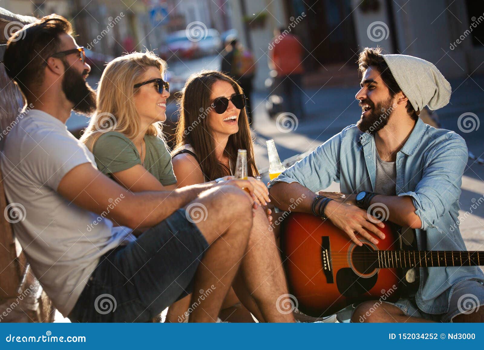 Group of Friends Having Fun and Hanging Out Outdoors Stock Photo ...