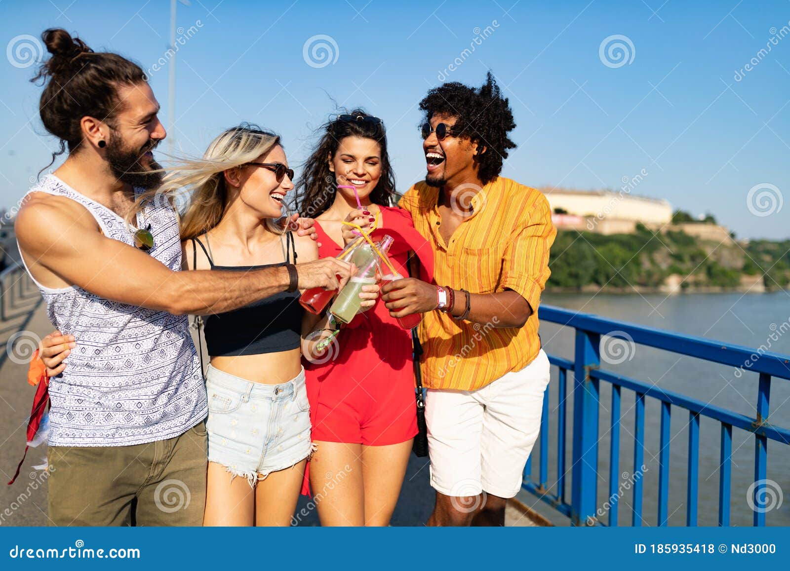 Group of Friends Having Fun and Hanging Out Outdoors Stock Photo ...