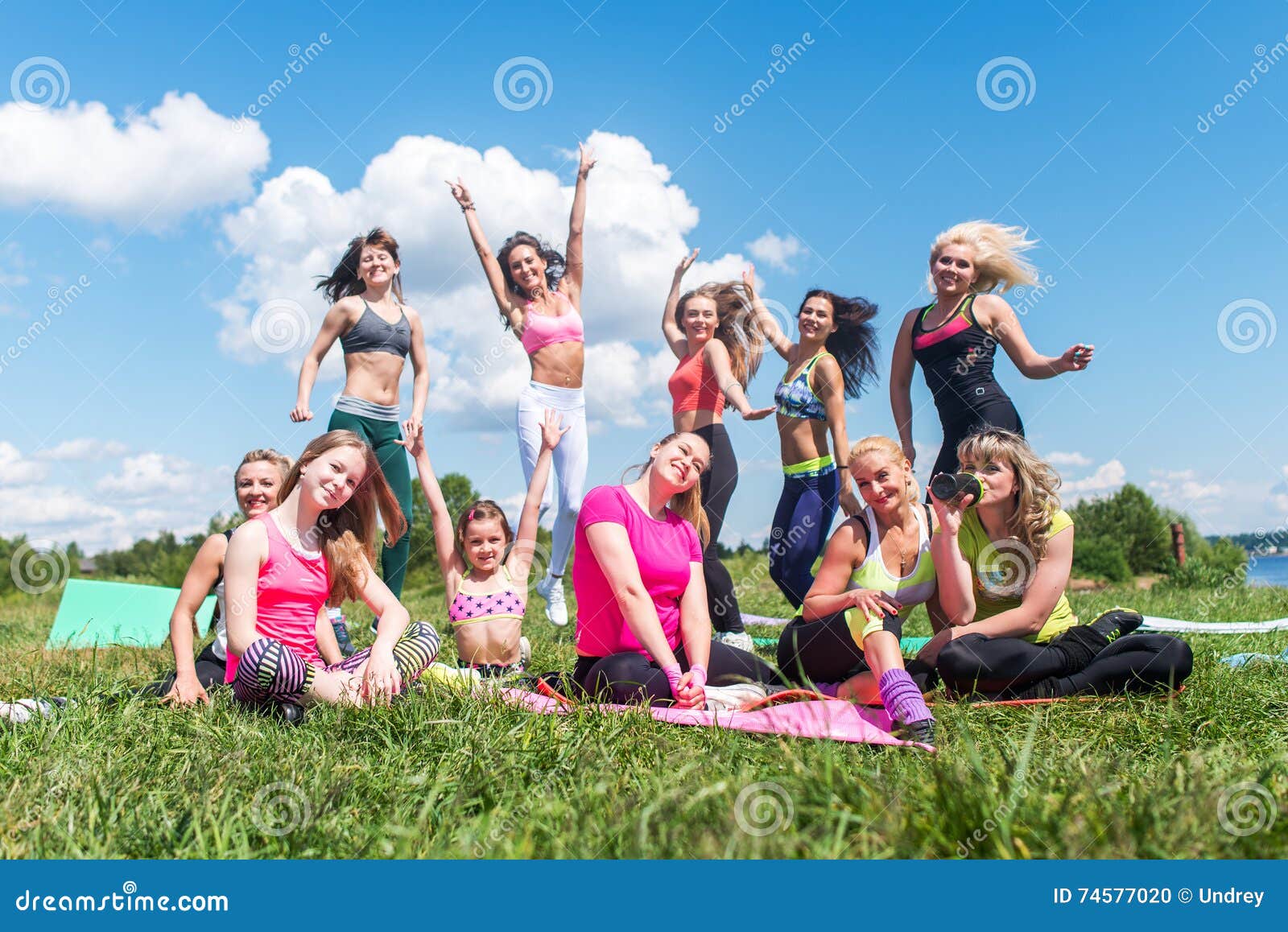 Group of Friends Having Fun in a Park on Sunny Day. Stock Photo - Image ...