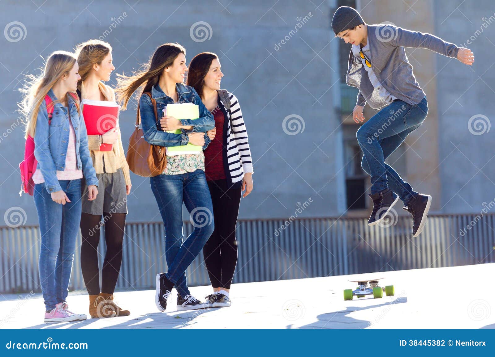 A Group of Friends Having Fun with Skate in the Street Stock Photo ...