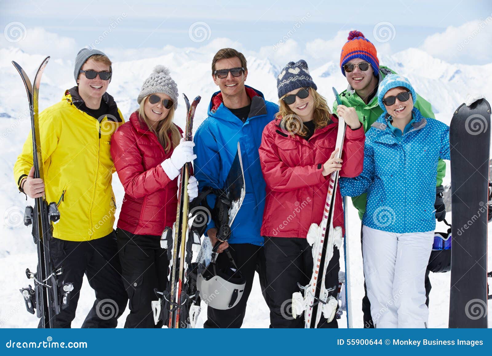 Group of Friends Having Fun on Ski Holiday in Mountains Stock Photo ...