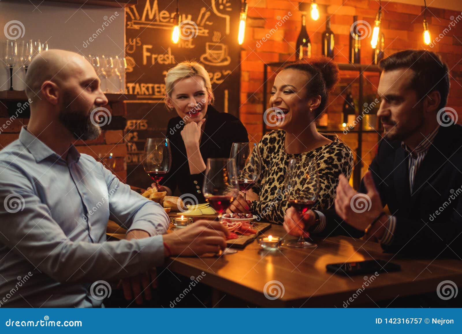 Group of Friends Having Fun Talk Behind Bar Counter in a Cafe Stock ...