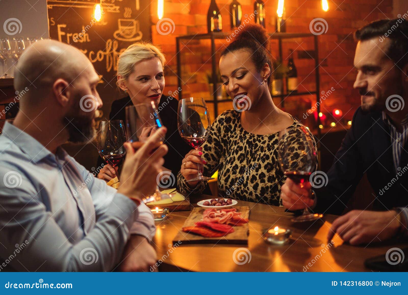 Group of Friends Having Fun Talk Behind Bar Counter in a Cafe Stock ...