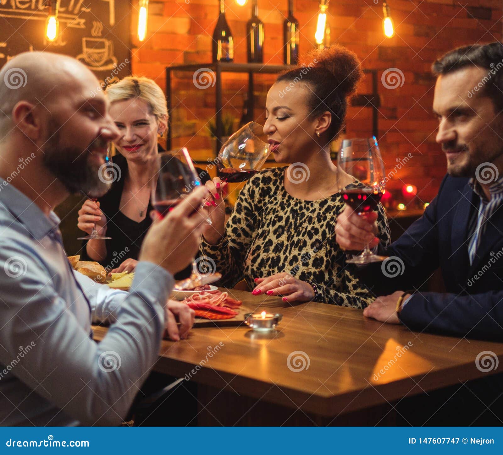 Group of Friends Having Fun Talk Behind Bar Counter in a Cafe Stock ...